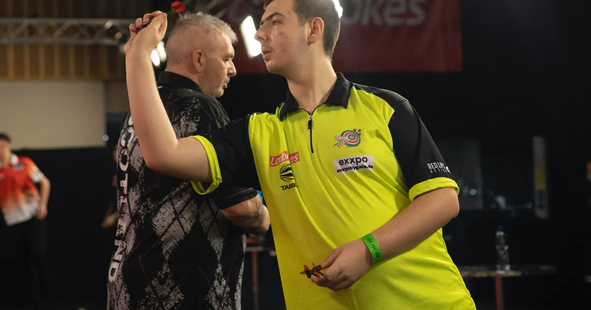 Record breaking debutant Bialecki pins early nine-dart finish to begin ...