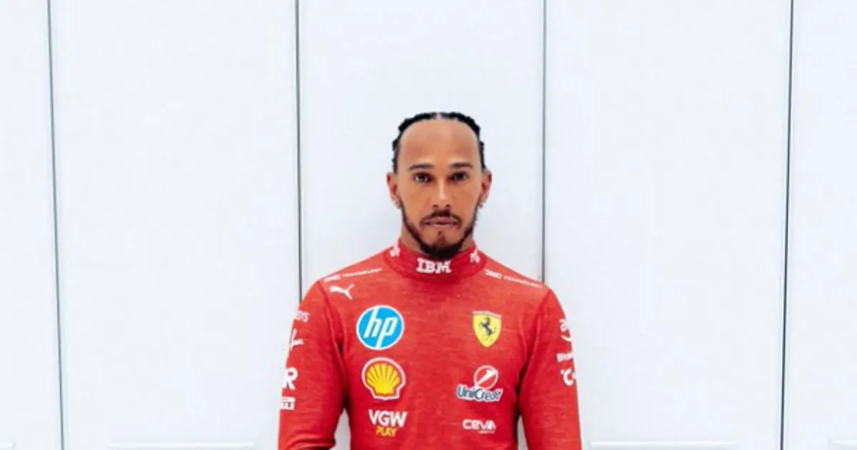 PHOTO: Lewis Hamilton wears historic Ferrari red suit for the first time!