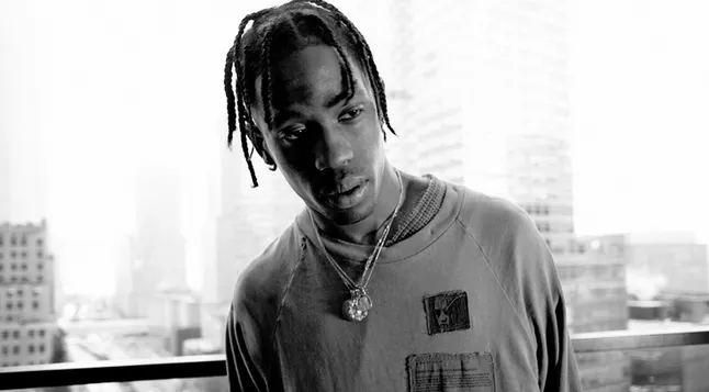 Travis Scott in gulle bui en helpt studenten met afbetaling collegegeld