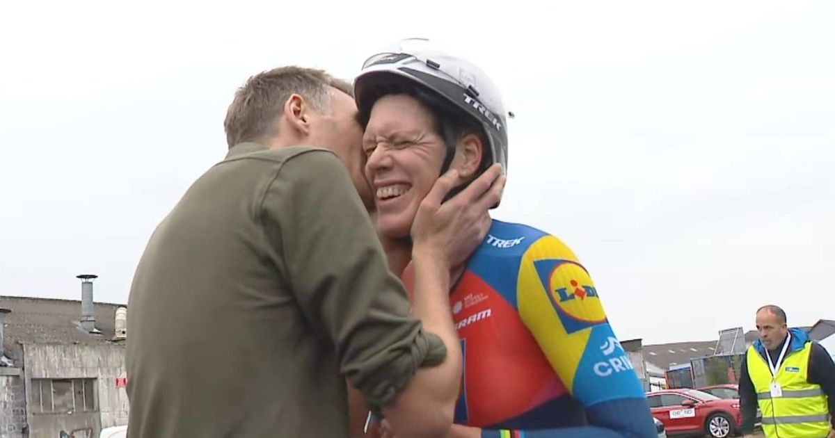 Ellen van Dijk and Joshua Tarling celebrate victory in France