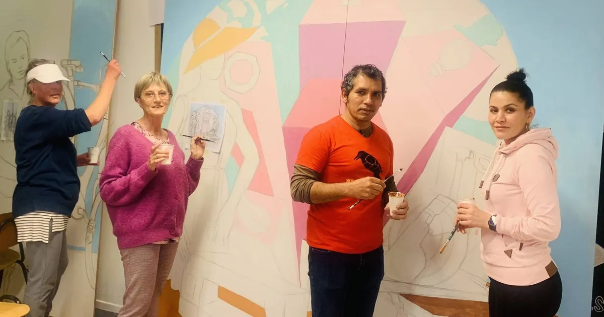 Samenwerken aan een kunstwerk bij inZet