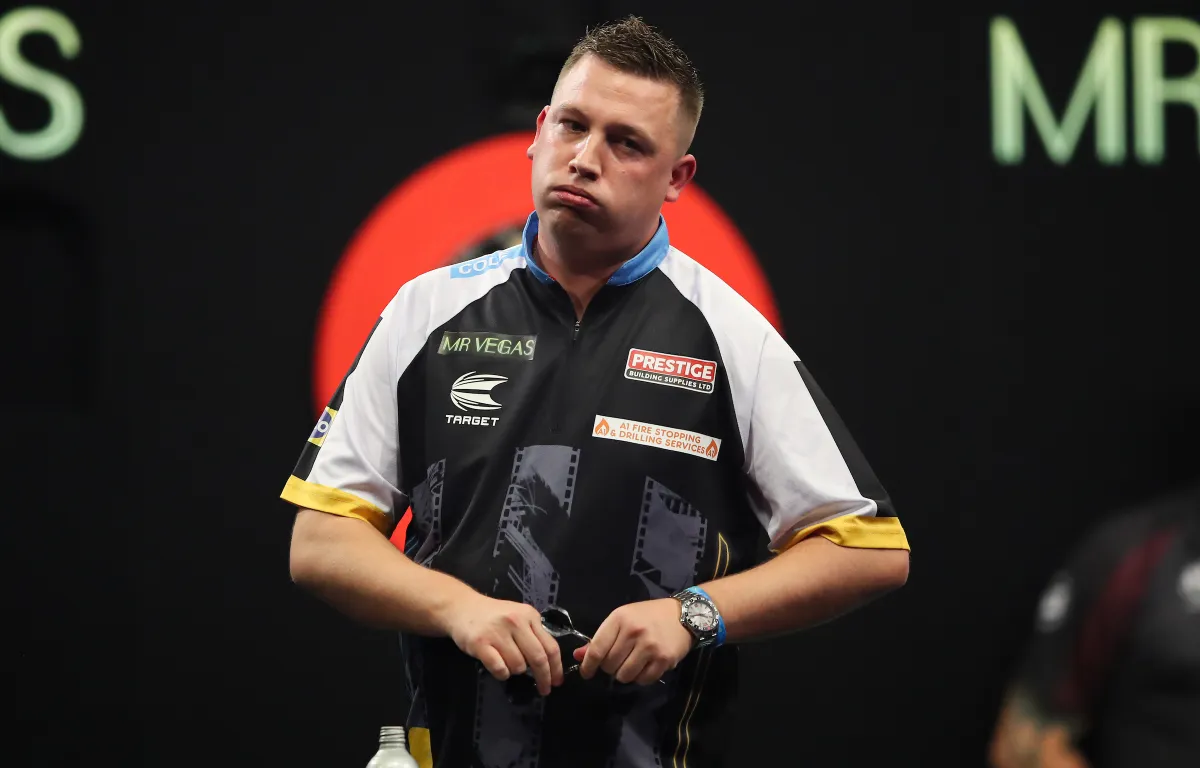 Chris Dobey opens Players Championship Finals account with Raymond van ...