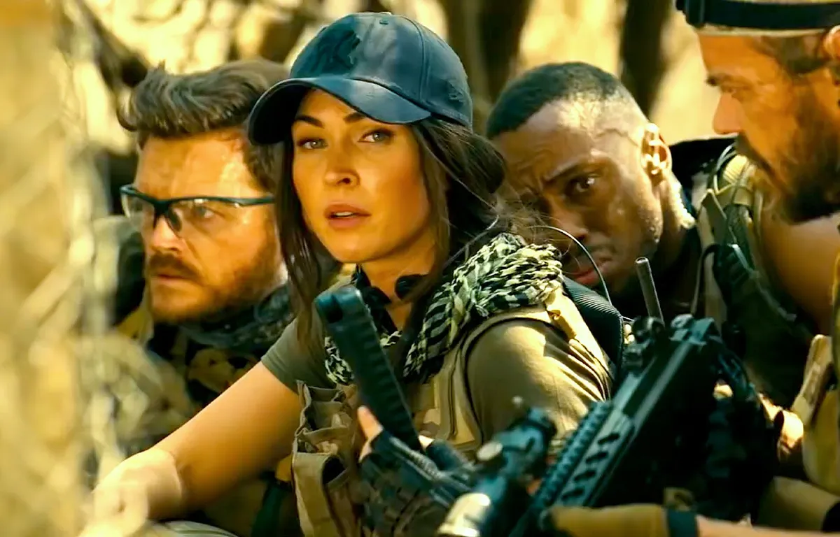 Megan Fox knokt met leeuwen en gijzelaars in Rogue