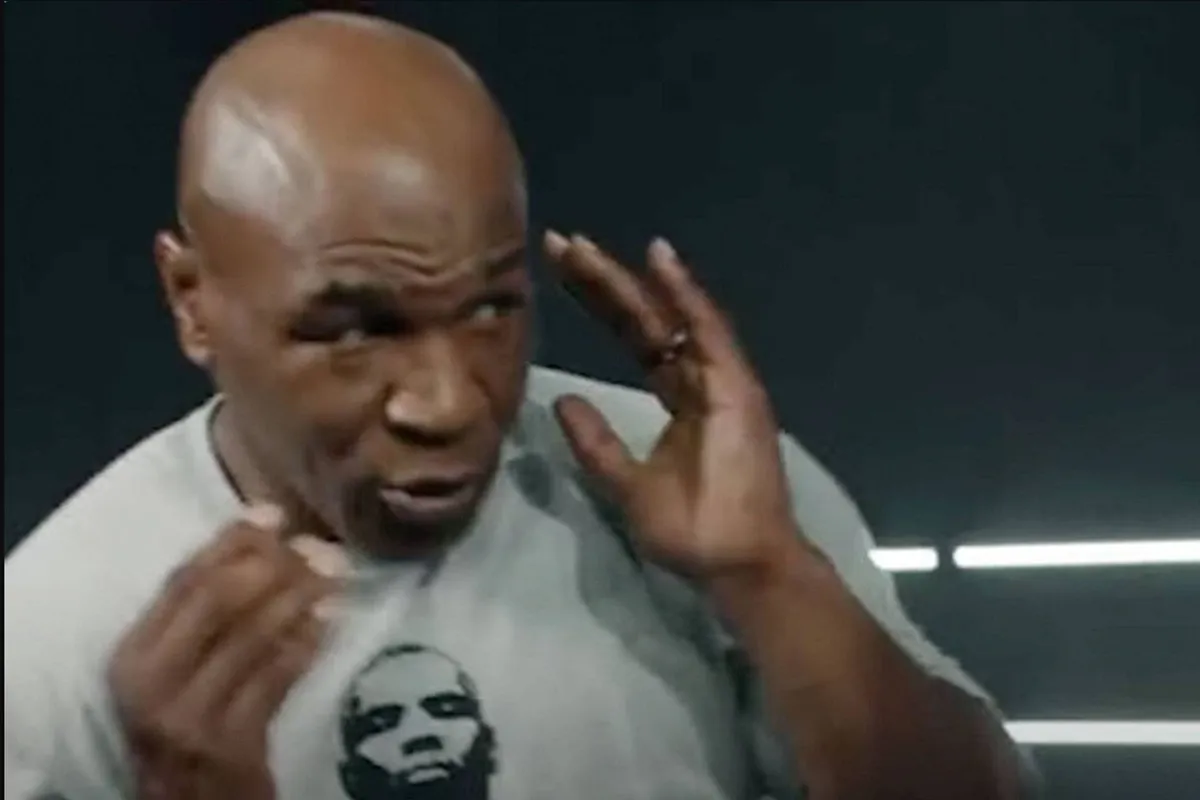 De man waar Mike Tyson zelfs bang voor is - sloeg Holyfield bijna dood ...