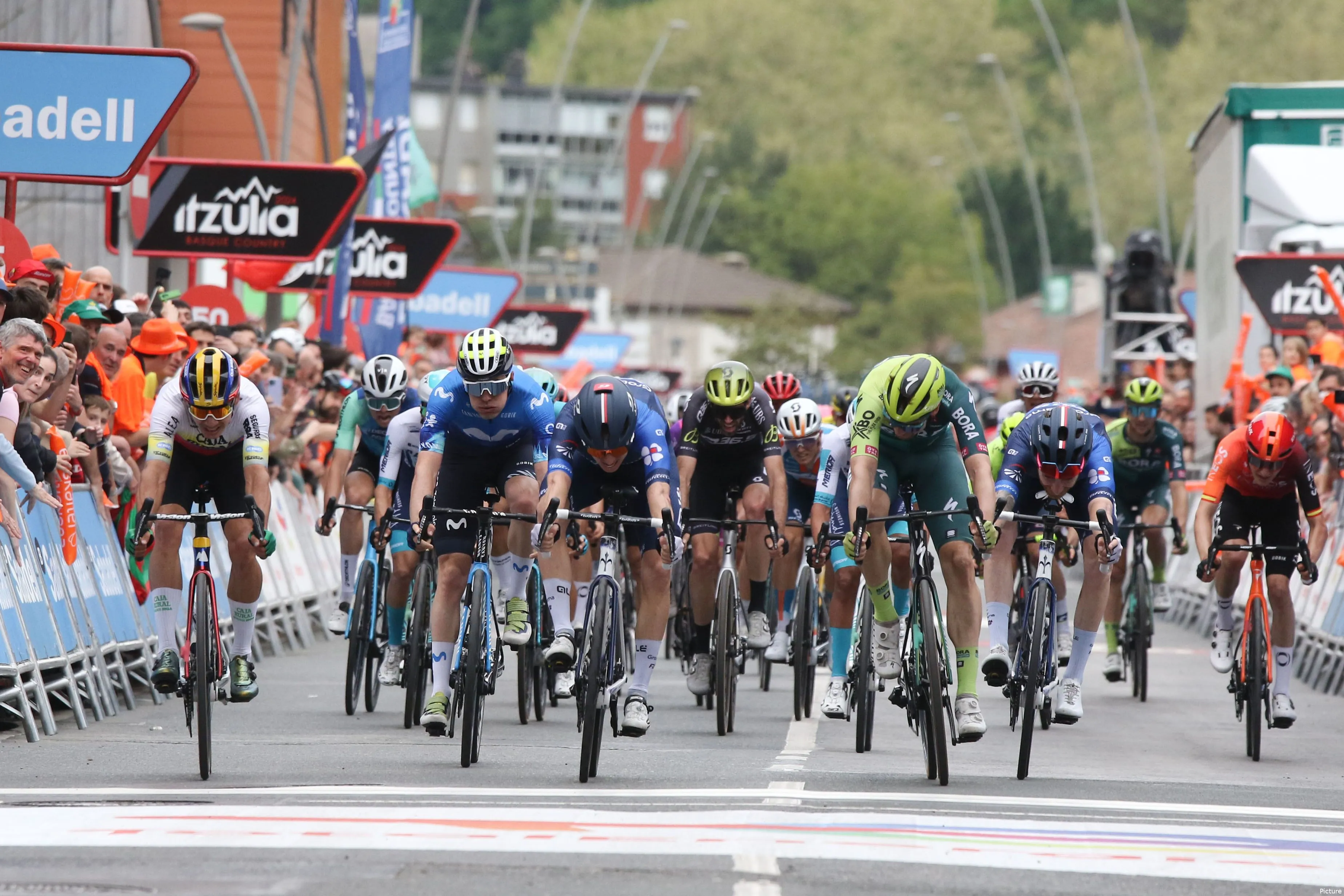 Romain Gregoire wins incredibly close sprint from reduced bunch on ...